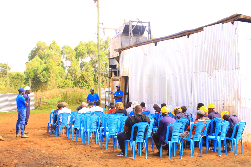 Study tour team viewing biochar bags